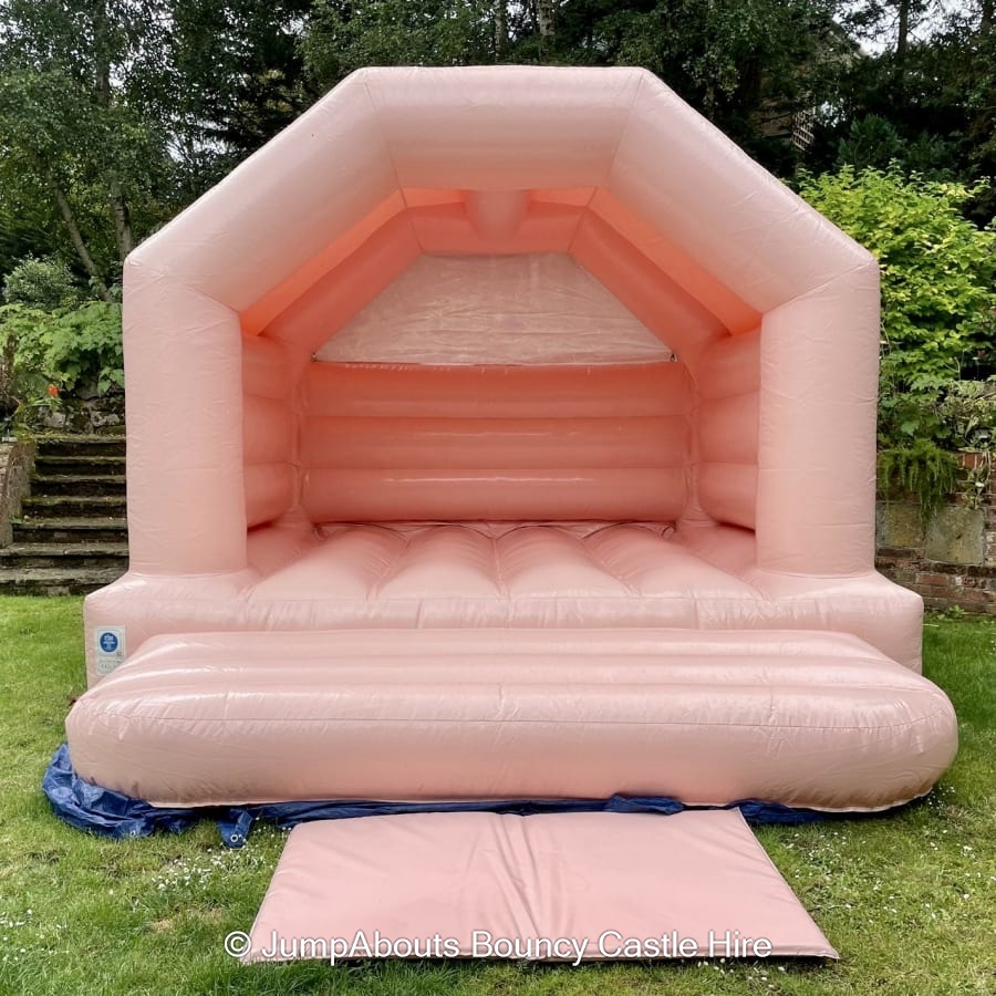 Kids Pastel Peach Roof Bouncy Castle Hire – BJ’s Pastel Range